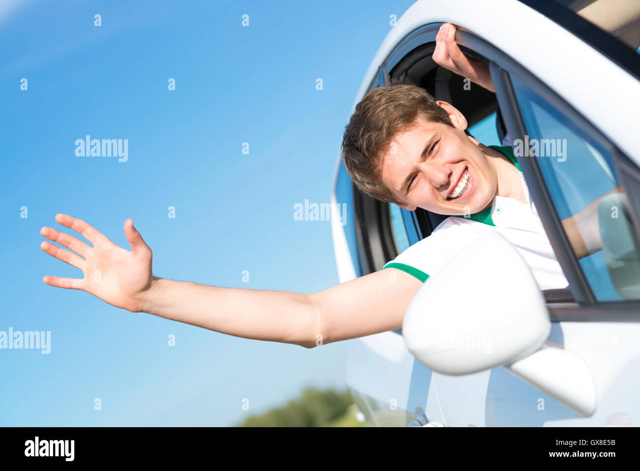 man stuck his hand out of the window Stock Photo - Alamy