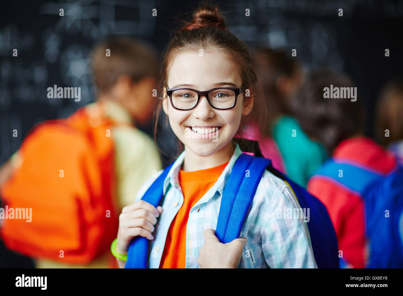 Happy elementary student Stock Photo - Alamy