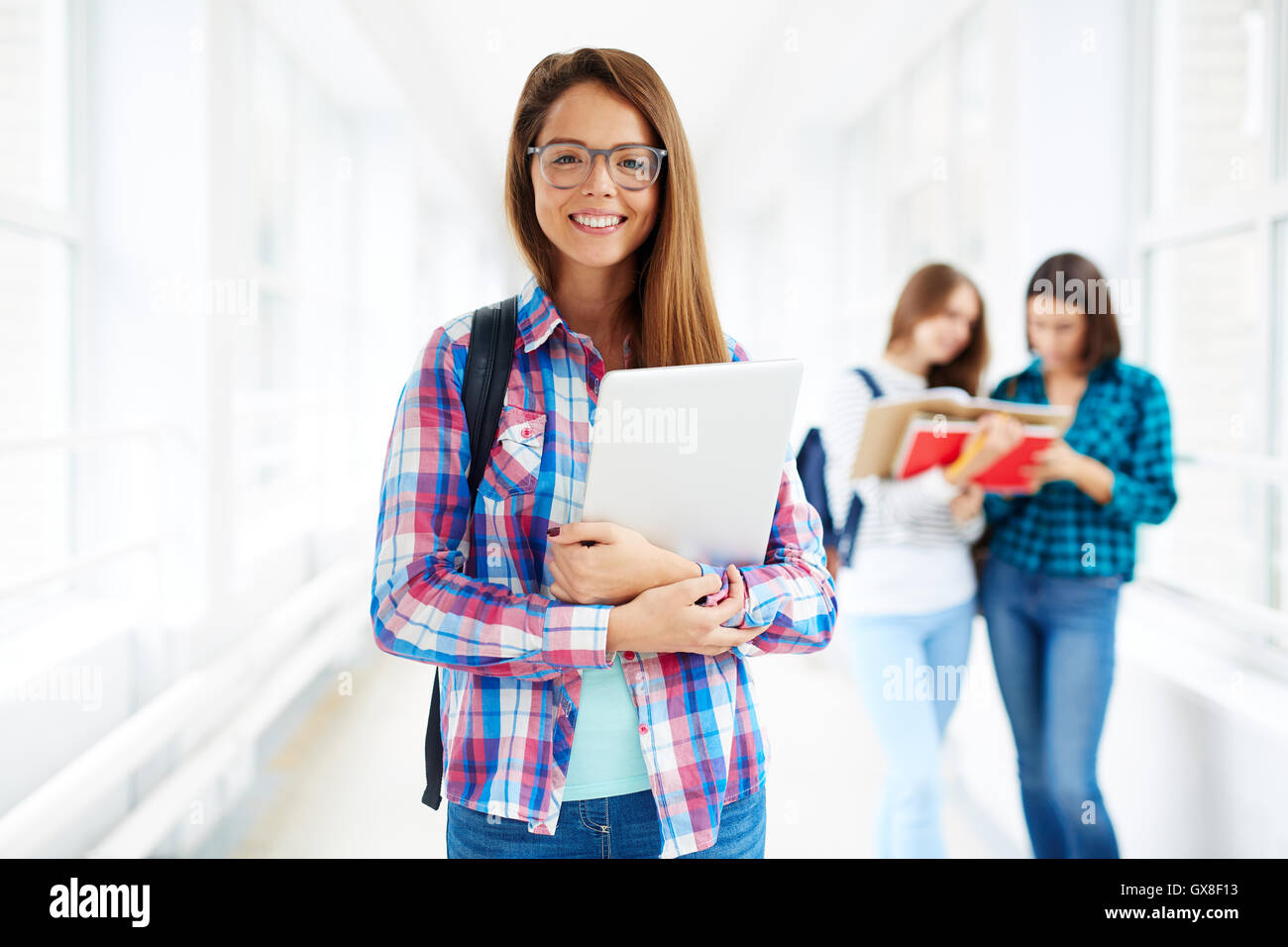 Student with laptop Stock Photo - Alamy