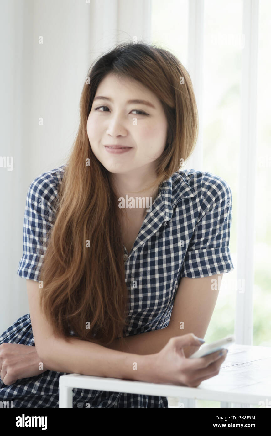young asian woman using smart phone in cafe, Vacations concept ...