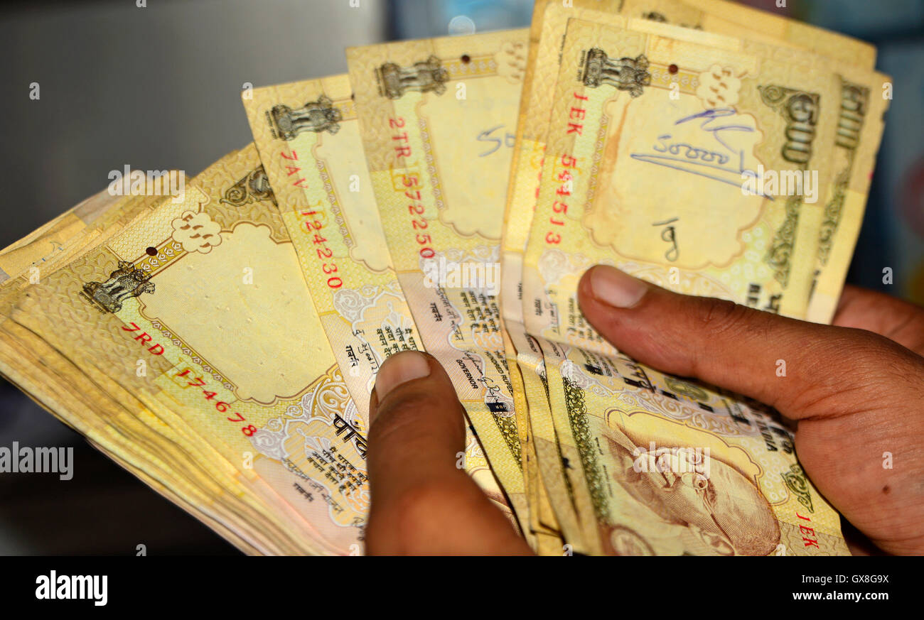 Indian bank cashier hi-res stock photography and images - Alamy