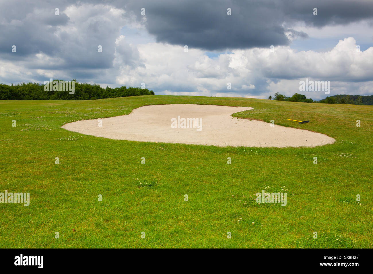 Sand golf bunker on a empty golf course before storm Stock Photo - Alamy