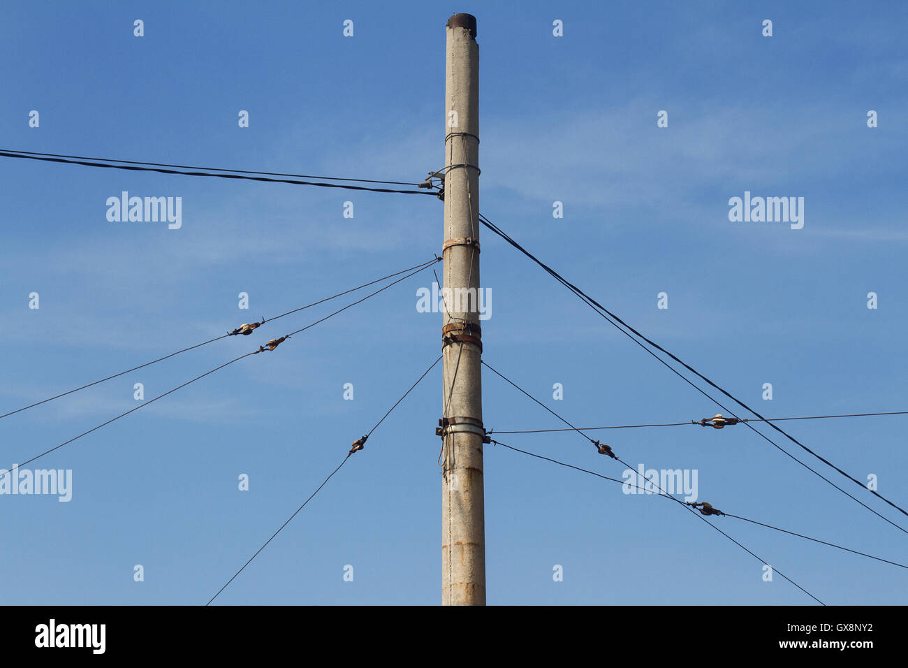Horizontal photo of concrete pillar anchored with steel cables Stock ...