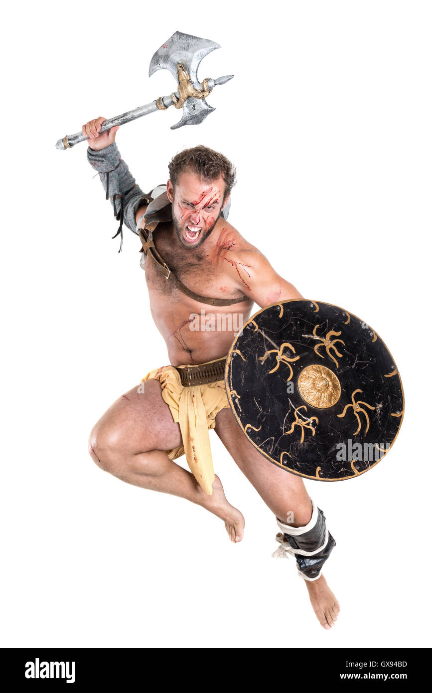 Ancient warrior or Gladiator jumping isolated in a white background ...