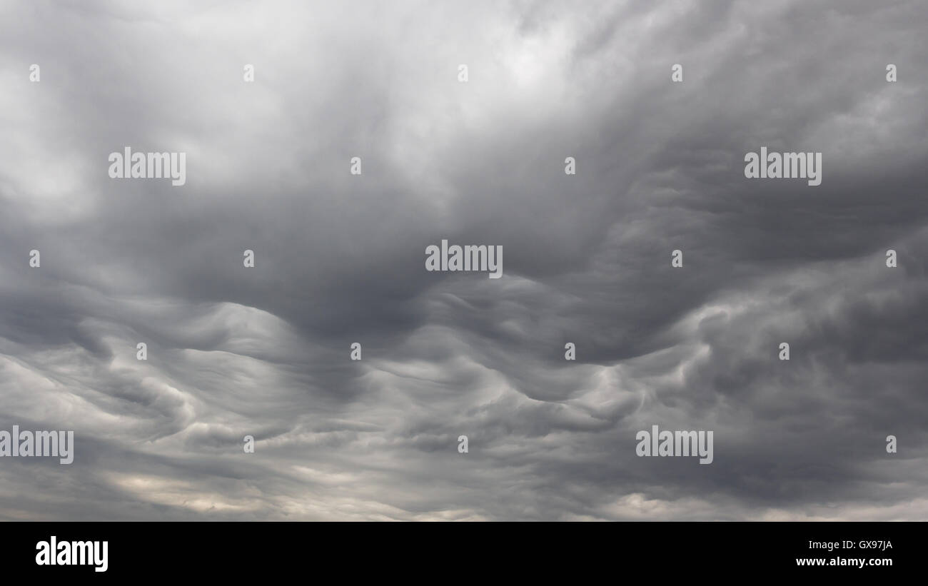 Dark ominous gray storm clouds. Dramatic sky Stock Photo - Alamy