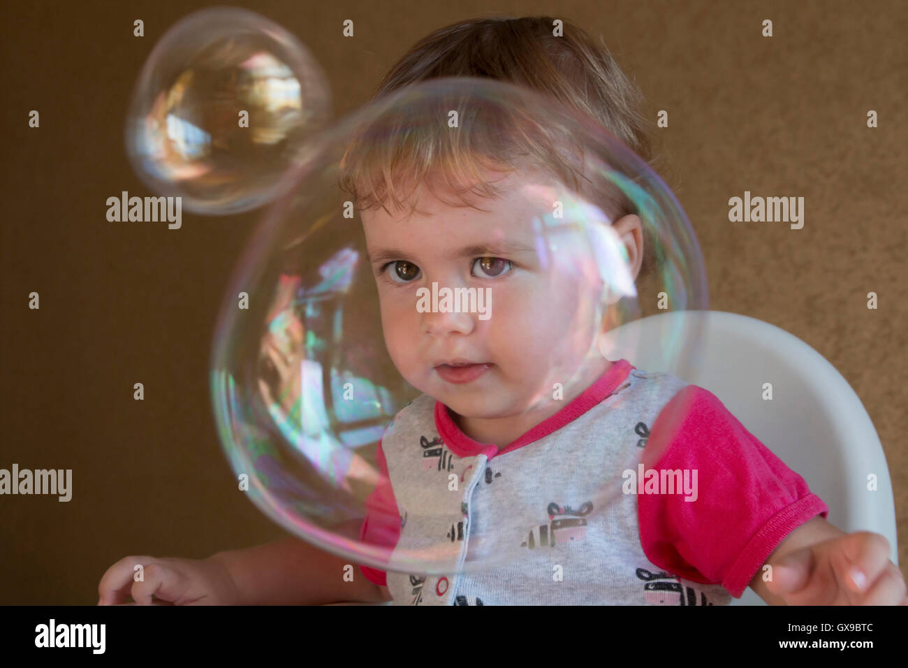 Kid blowing bubble hi-res stock photography and images - Alamy