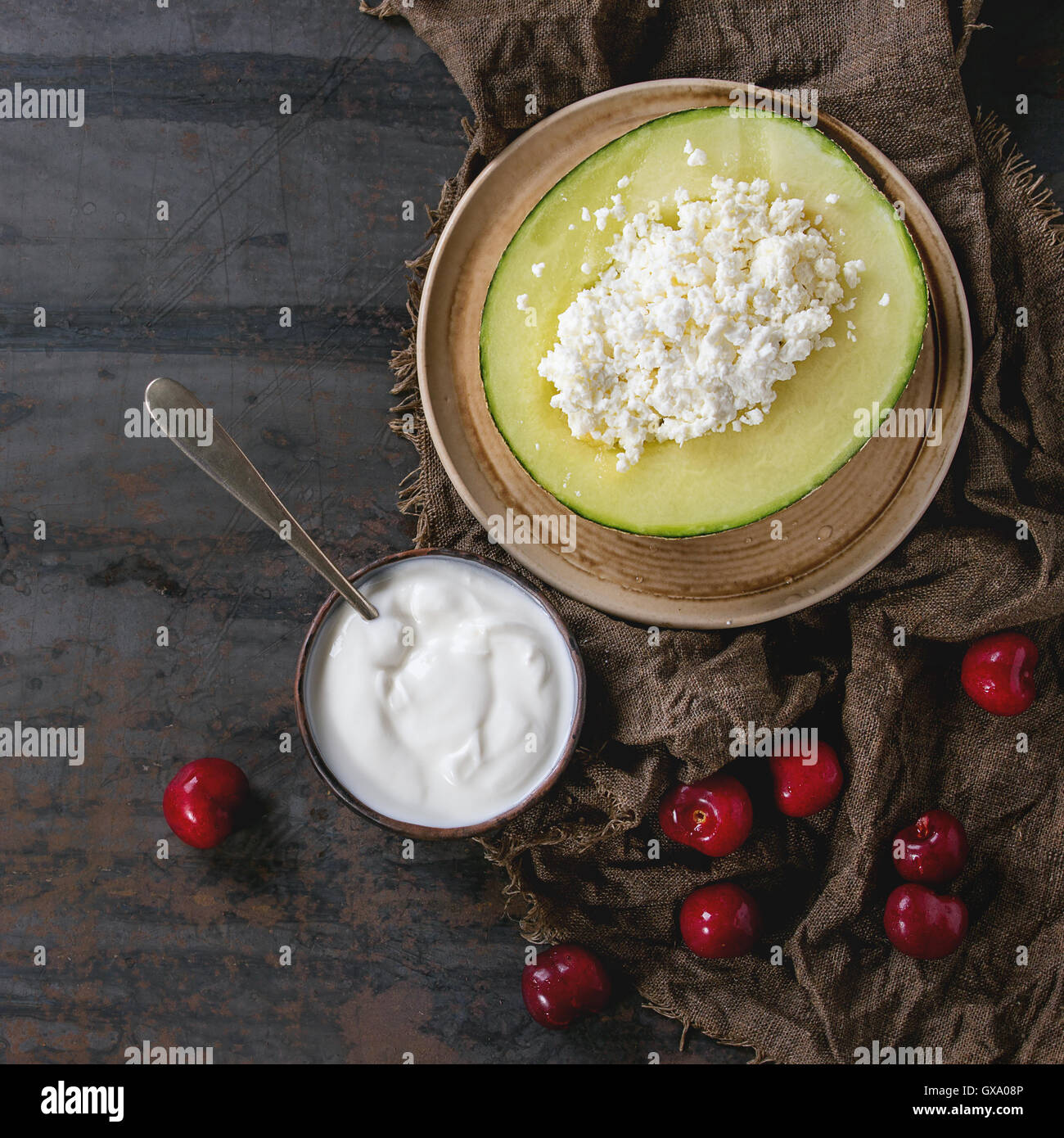 Cottage cheese in melon Stock Photo - Alamy