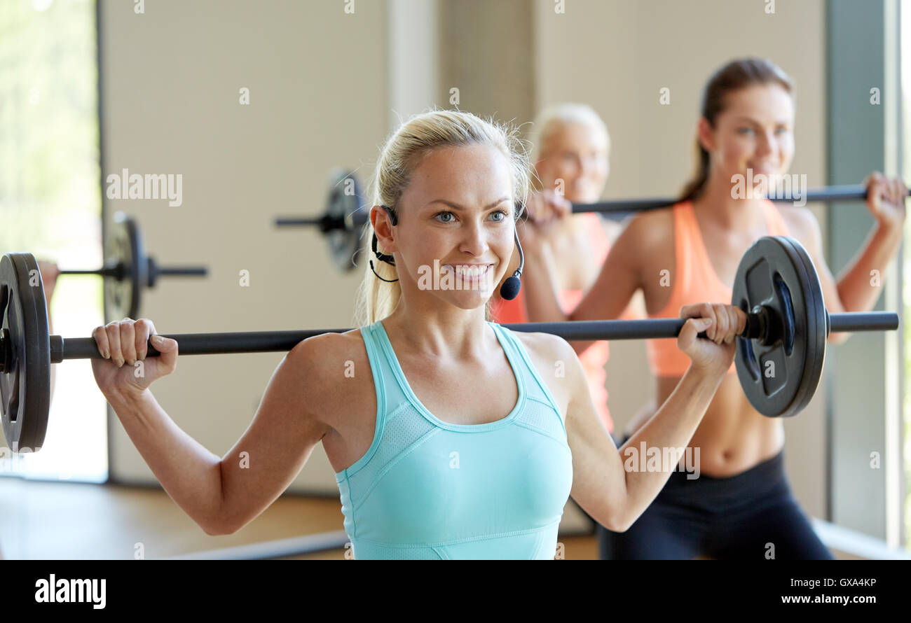 group of women with barbells exercising in gym Stock Photo - Alamy