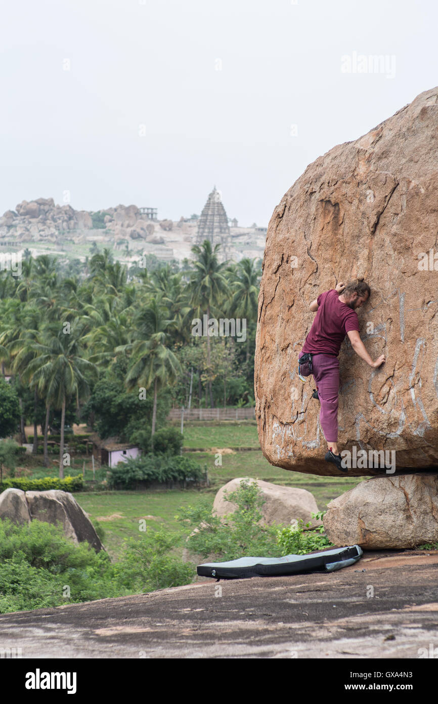 Self portrait of a rock climber on a boulder in Asia Stock Photo - Alamy