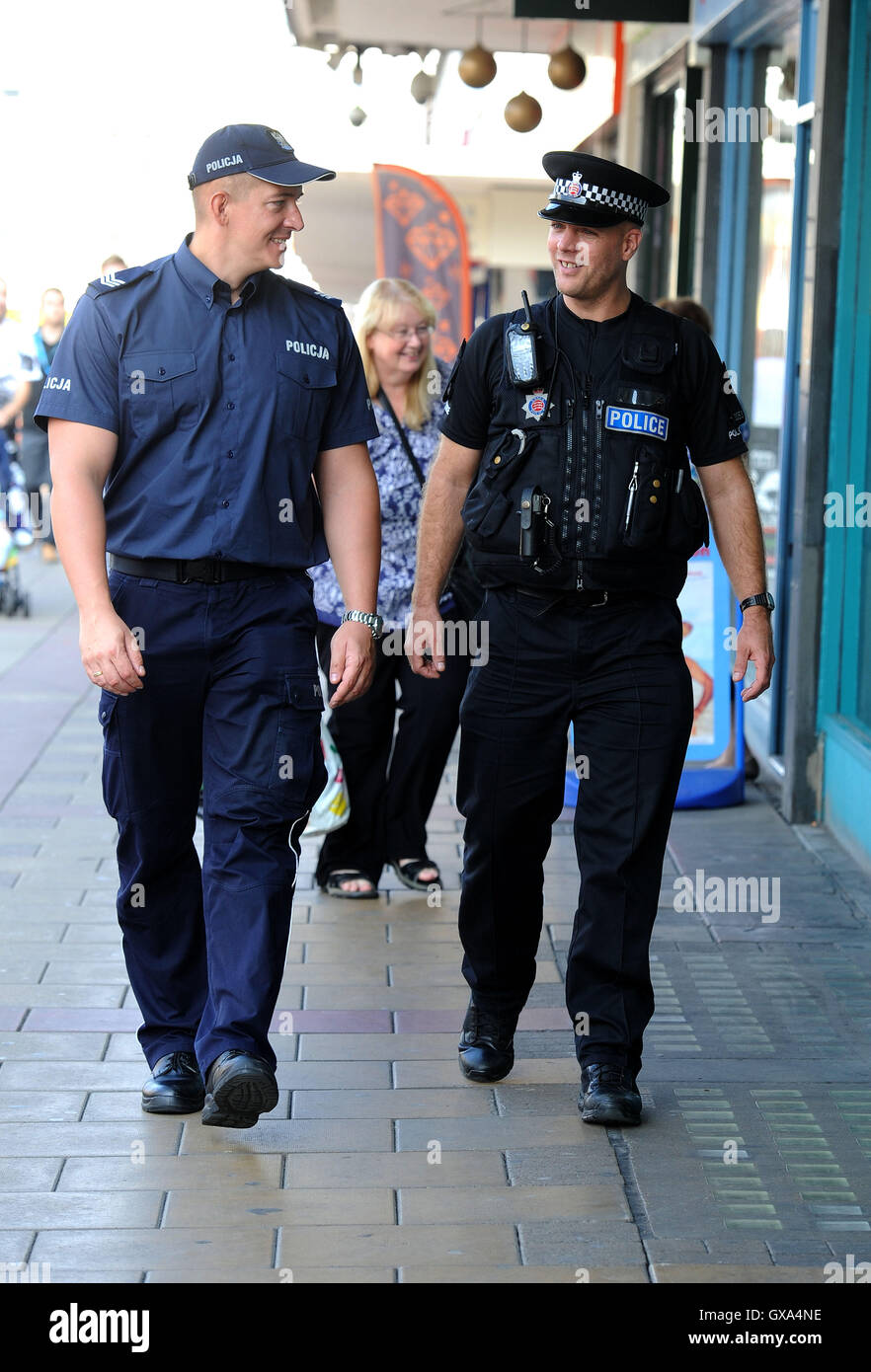 Chief Sergeant Dariusz Tybura (left) from the Polish State Police walks ...