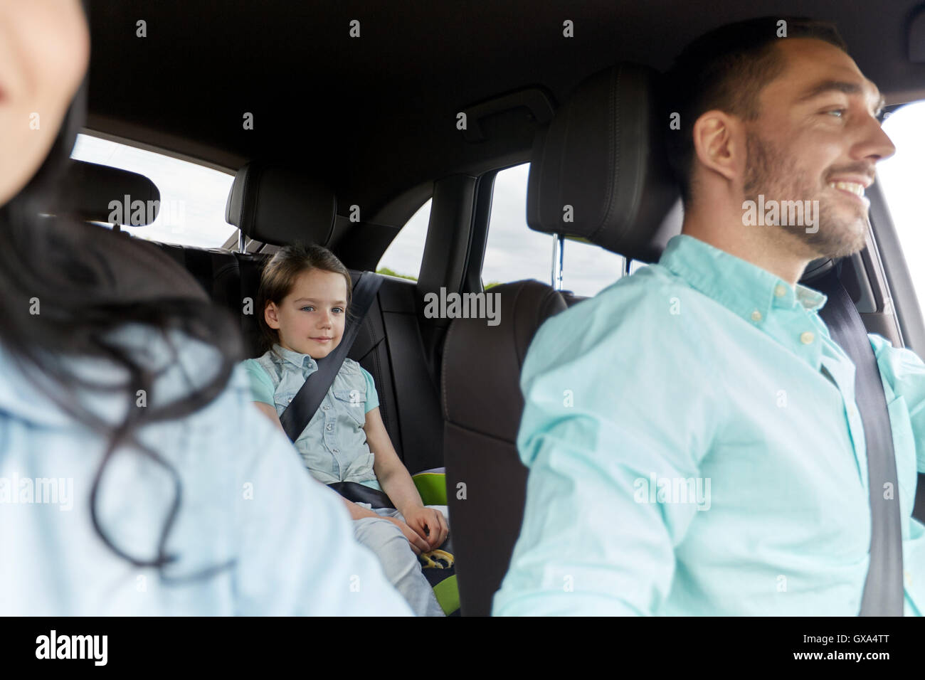 happy family with little child driving in car Stock Photo - Alamy