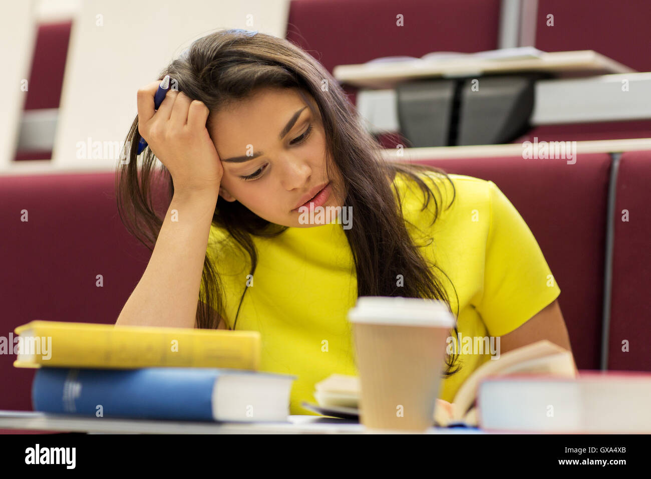 student girl with books and coffee on lecture Stock Photo - Alamy