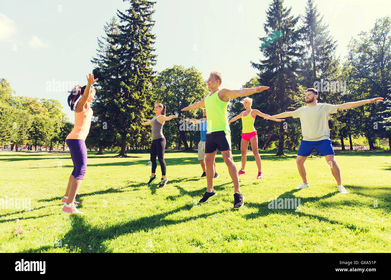 Group happy friends exercising hi-res stock photography and images - Alamy