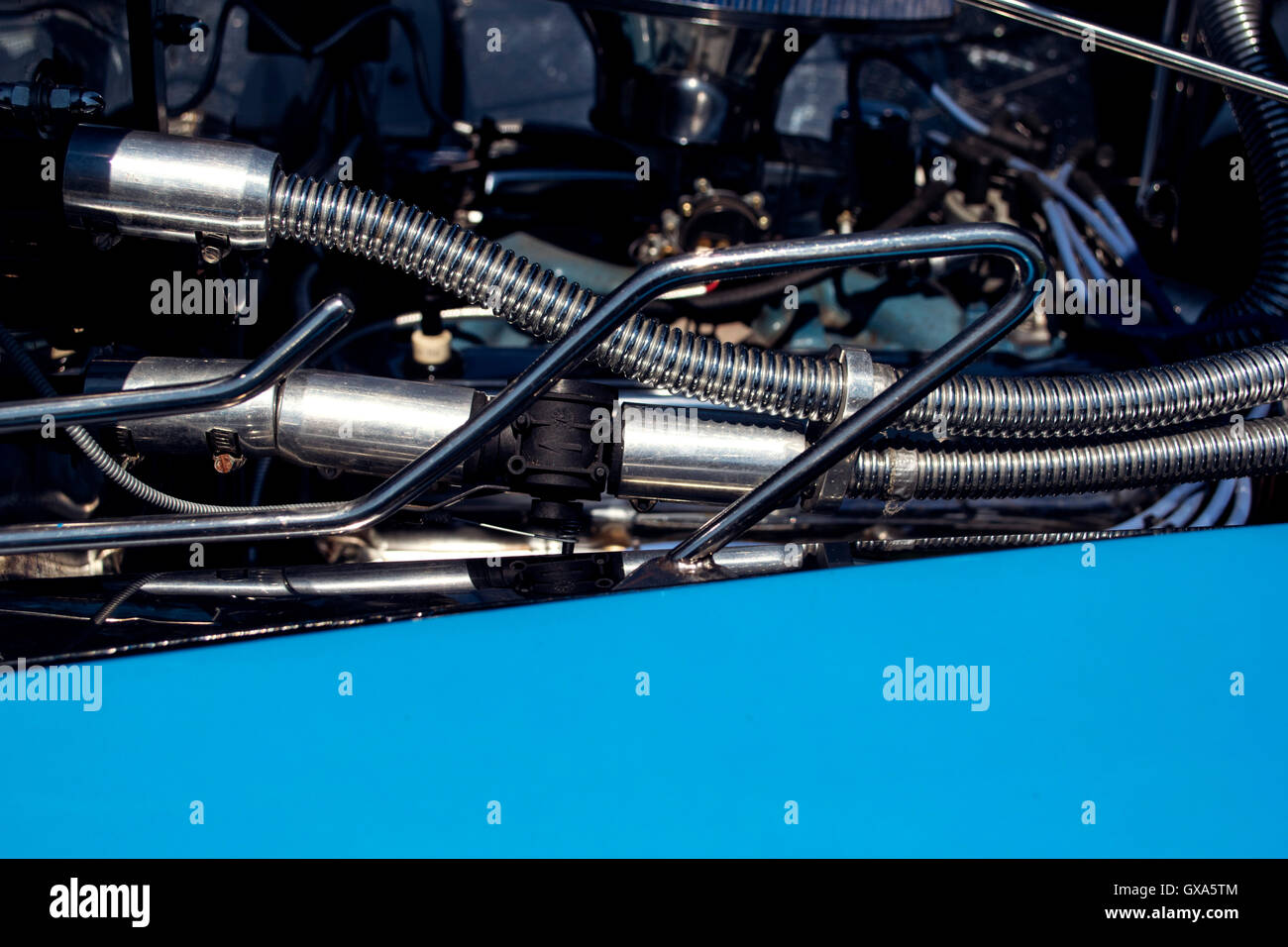 Engine of a blue car Stock Photo - Alamy