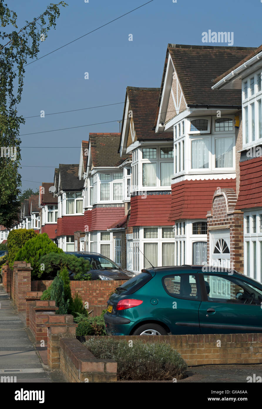 bay fronted houses of the 1920s forming part of a terrace in whitton ...