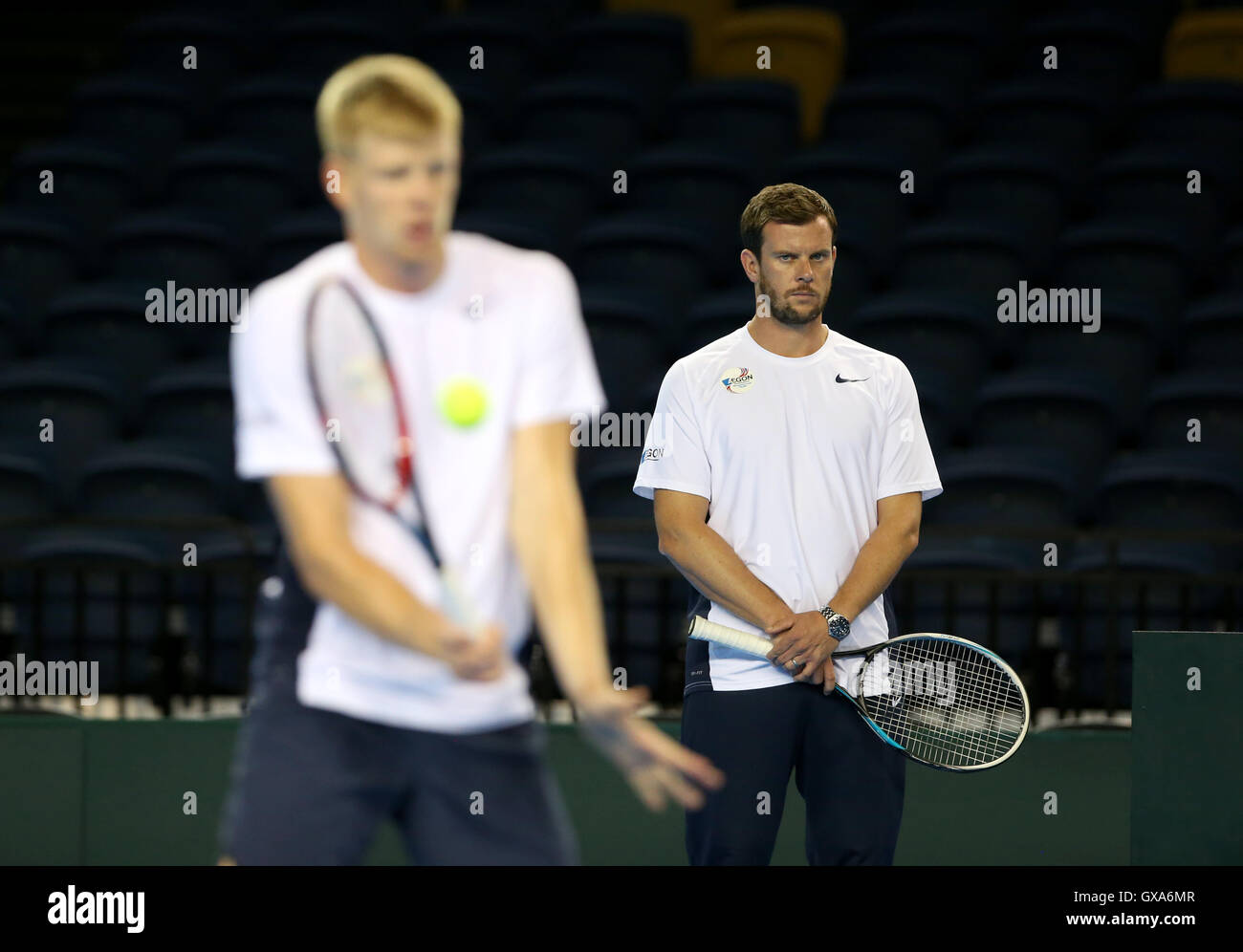 Great Britain captain Leon Smith looks on as Kyle Edmund warms-up ... Great Britain captain Leon Smith looks on as Kyle Edmund warms-up ...