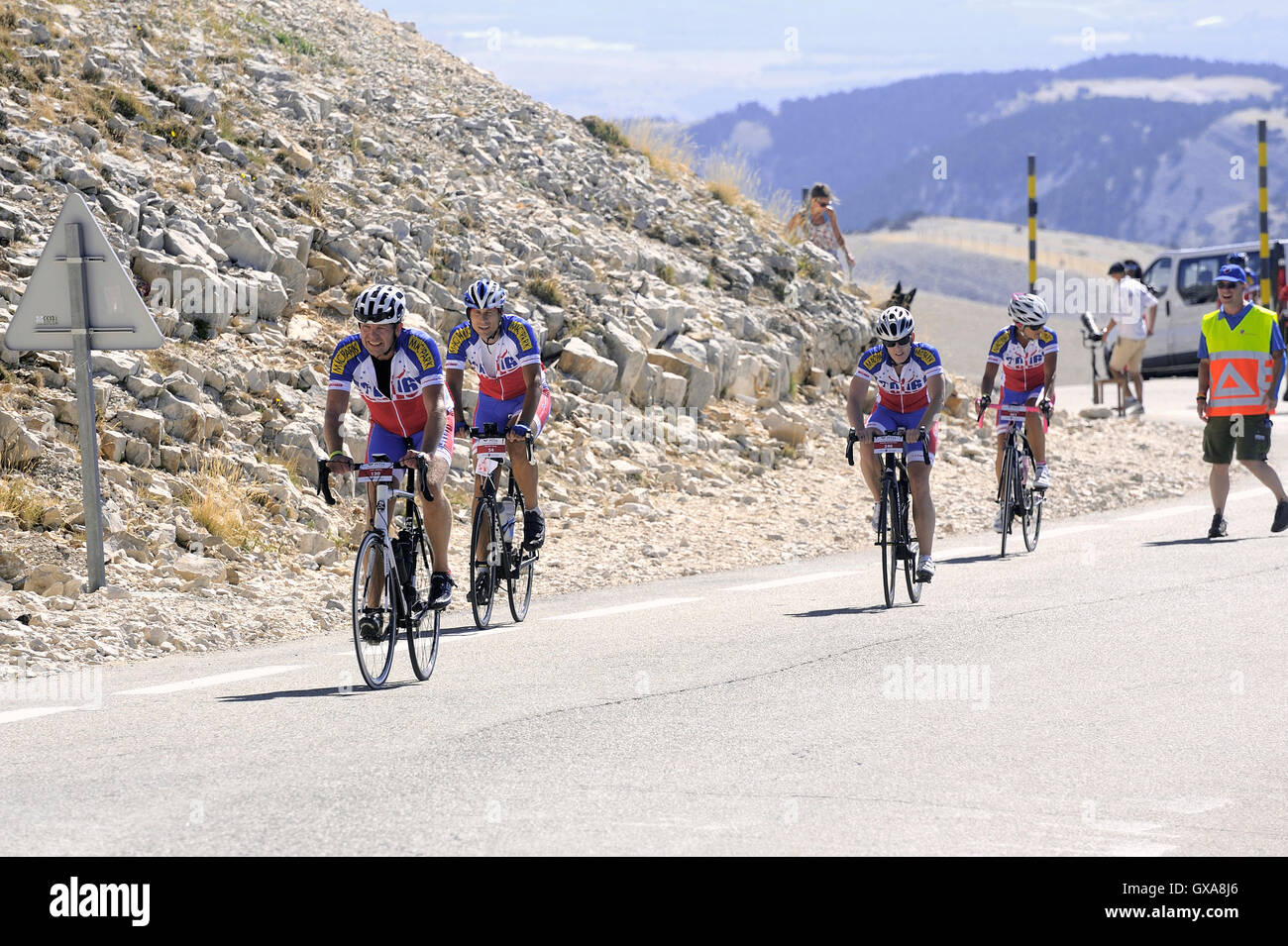 Many cyclist climb Mont Ventoux as a challenge up to 1912 meters with a ...