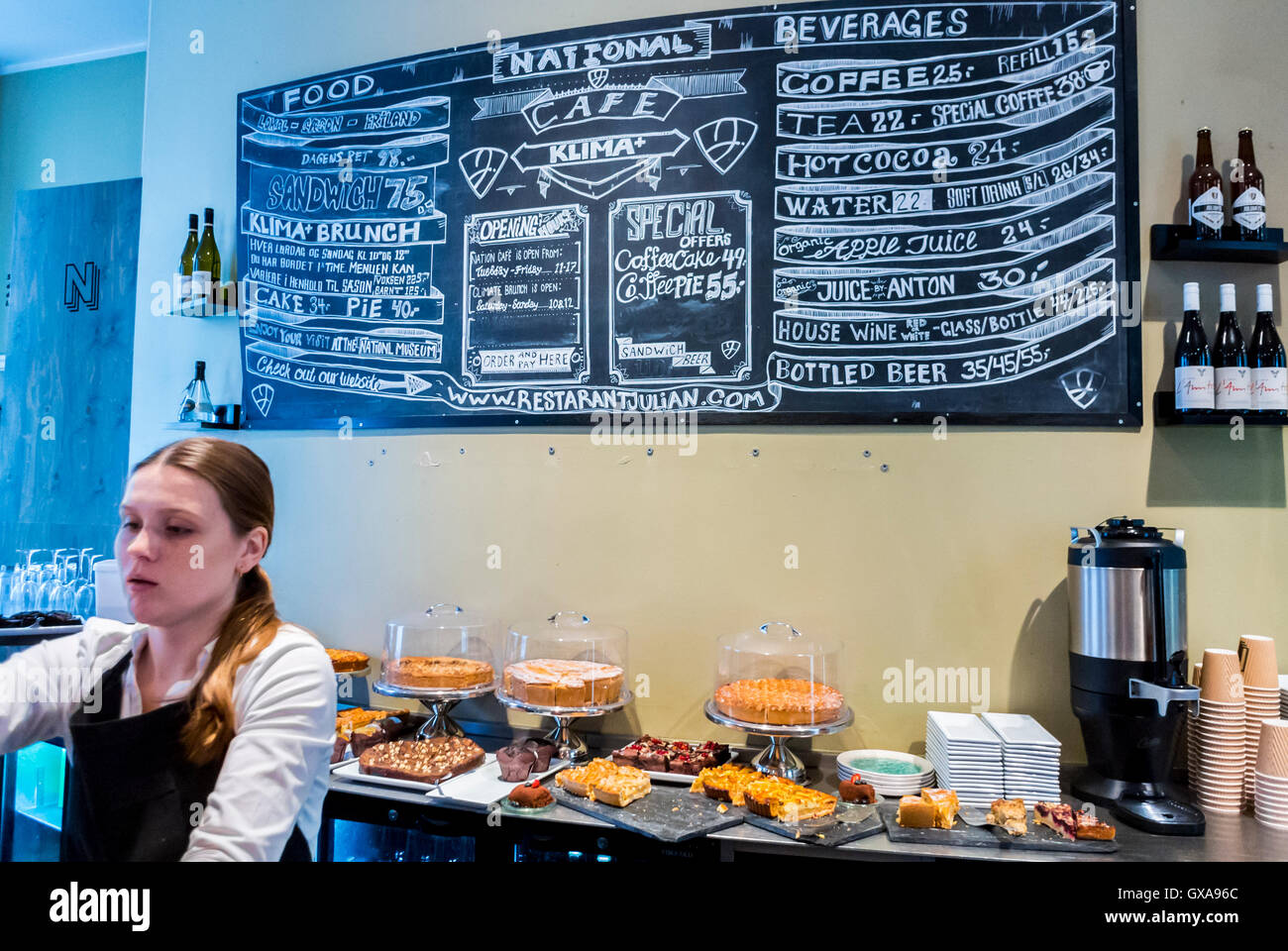 Baker working behind counter hi-res stock photography and images - Alamy