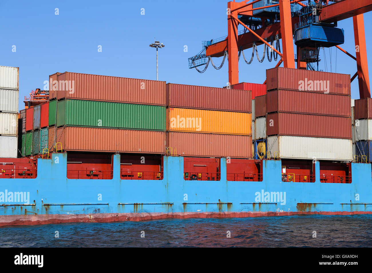 Container Ship is loading in a port Stock Photo - Alamy