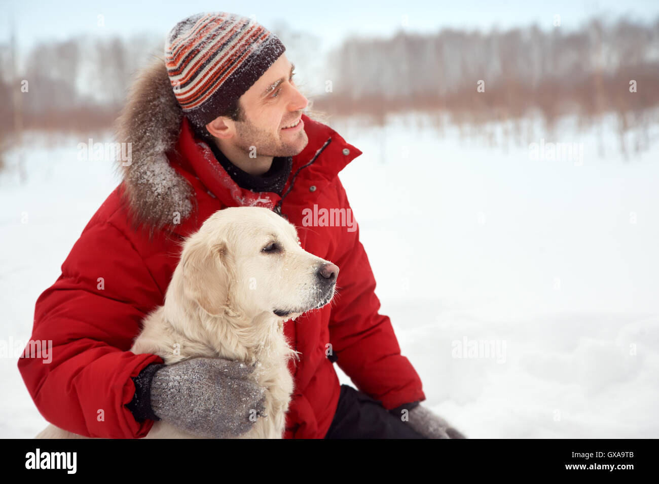 Labrador retriever with owner Stock Photo - Alamy