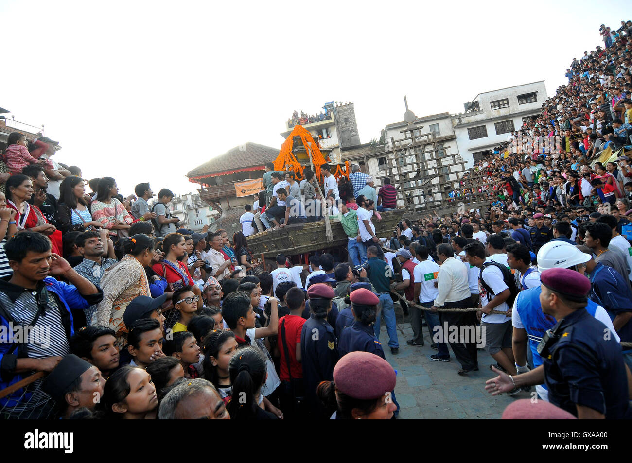 Devotees pulling the chariot of Living Goddess of Nepal 'Kumari' on the ...