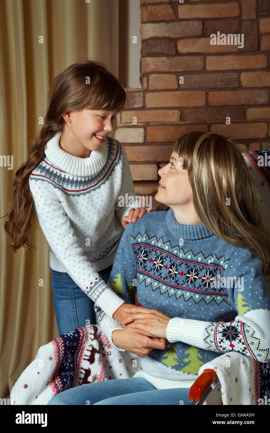 portrait of mother and daughter in sweaters Stock Photo - Alamy