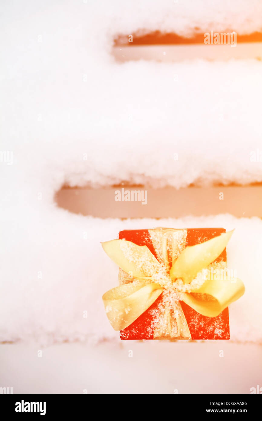 gift box in the snow outdoors Stock Photo - Alamy