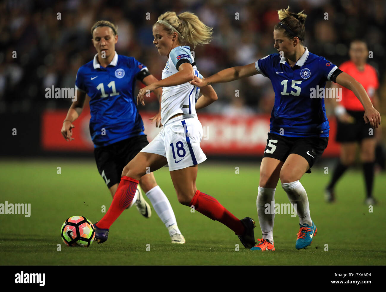 England's Rachel Daley (centre) gets away from Estonia's Inna Zlidnis ...