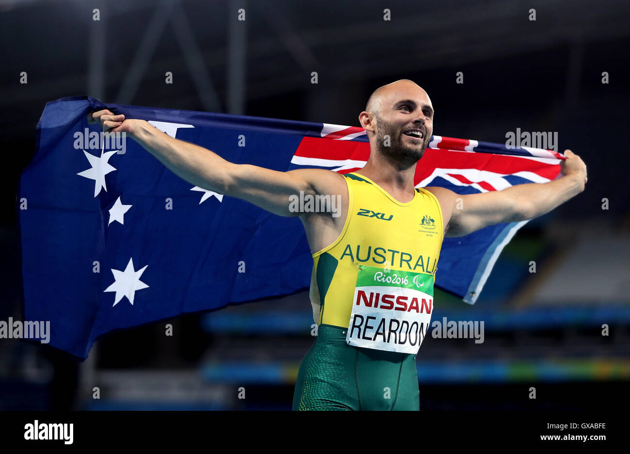 Australia's Scott Reardon celebrates gold in the Men's 100m - T42 Final ...