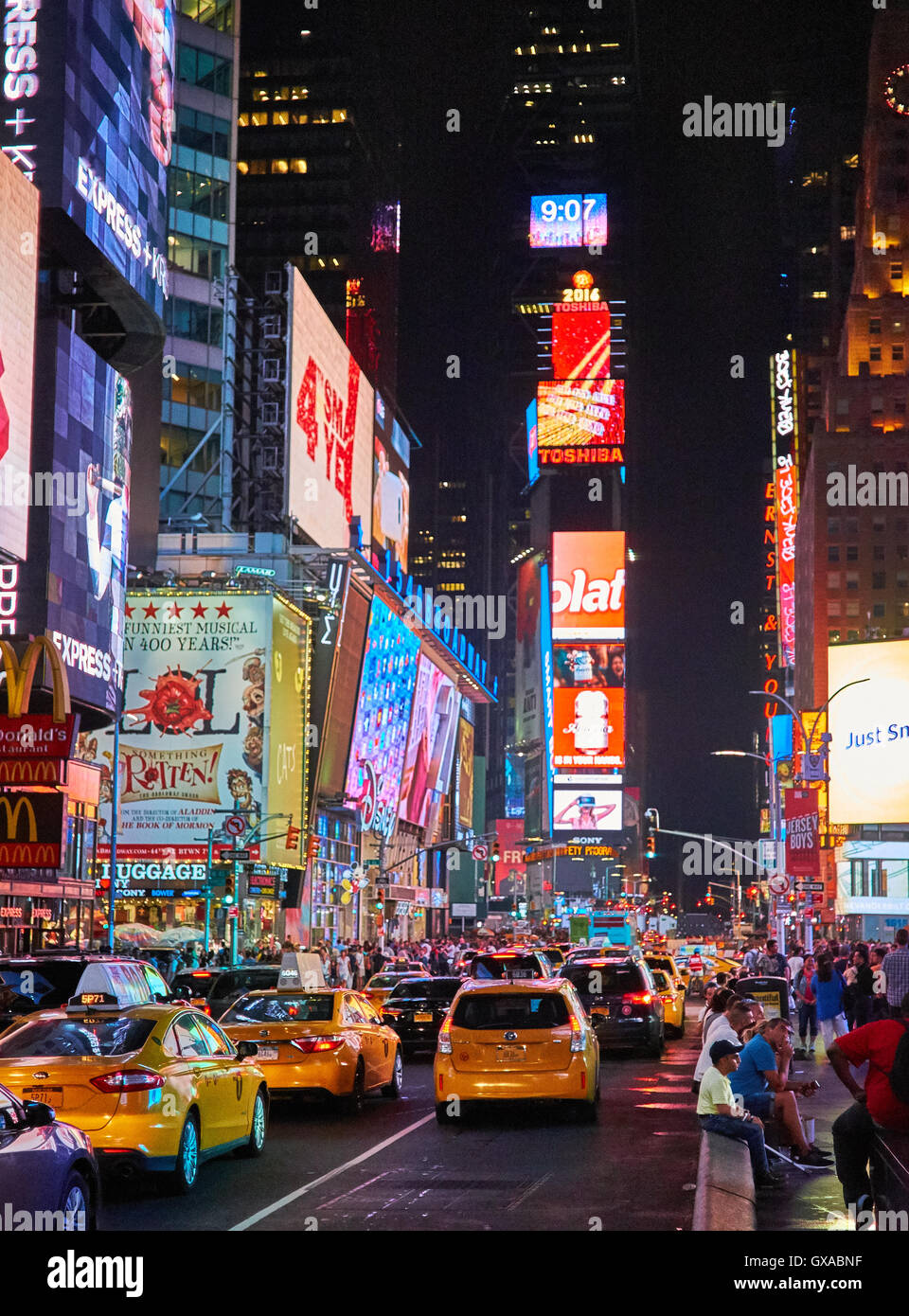 A busy weekday evening in Times Square, New York City Stock Photo - Alamy