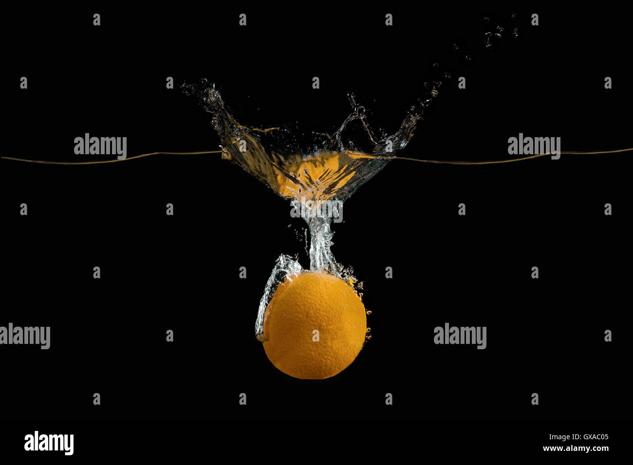 Orange fruit dropped water hi-res stock photography and images - Alamy