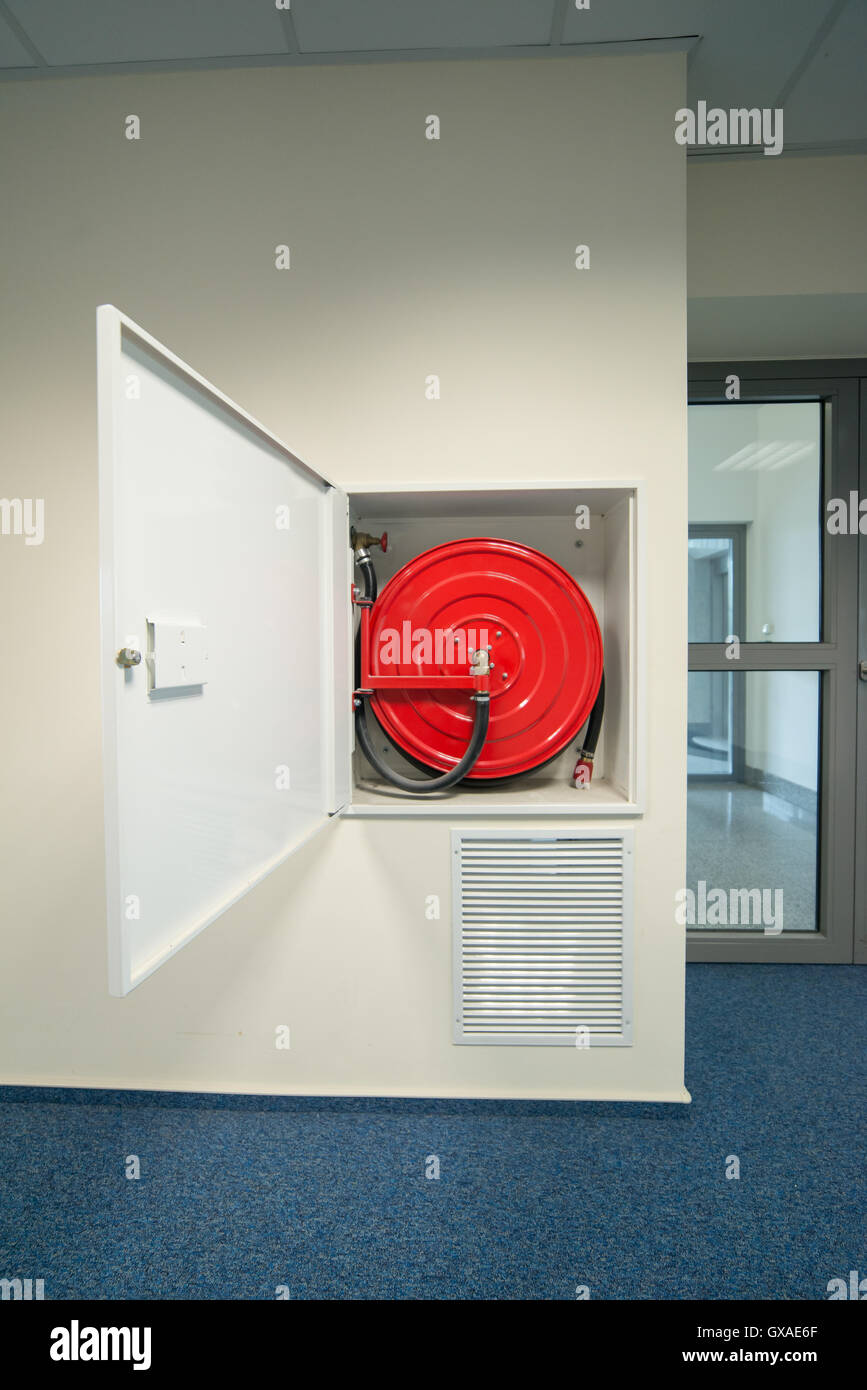 hydrant in an office building Stock Photo - Alamy