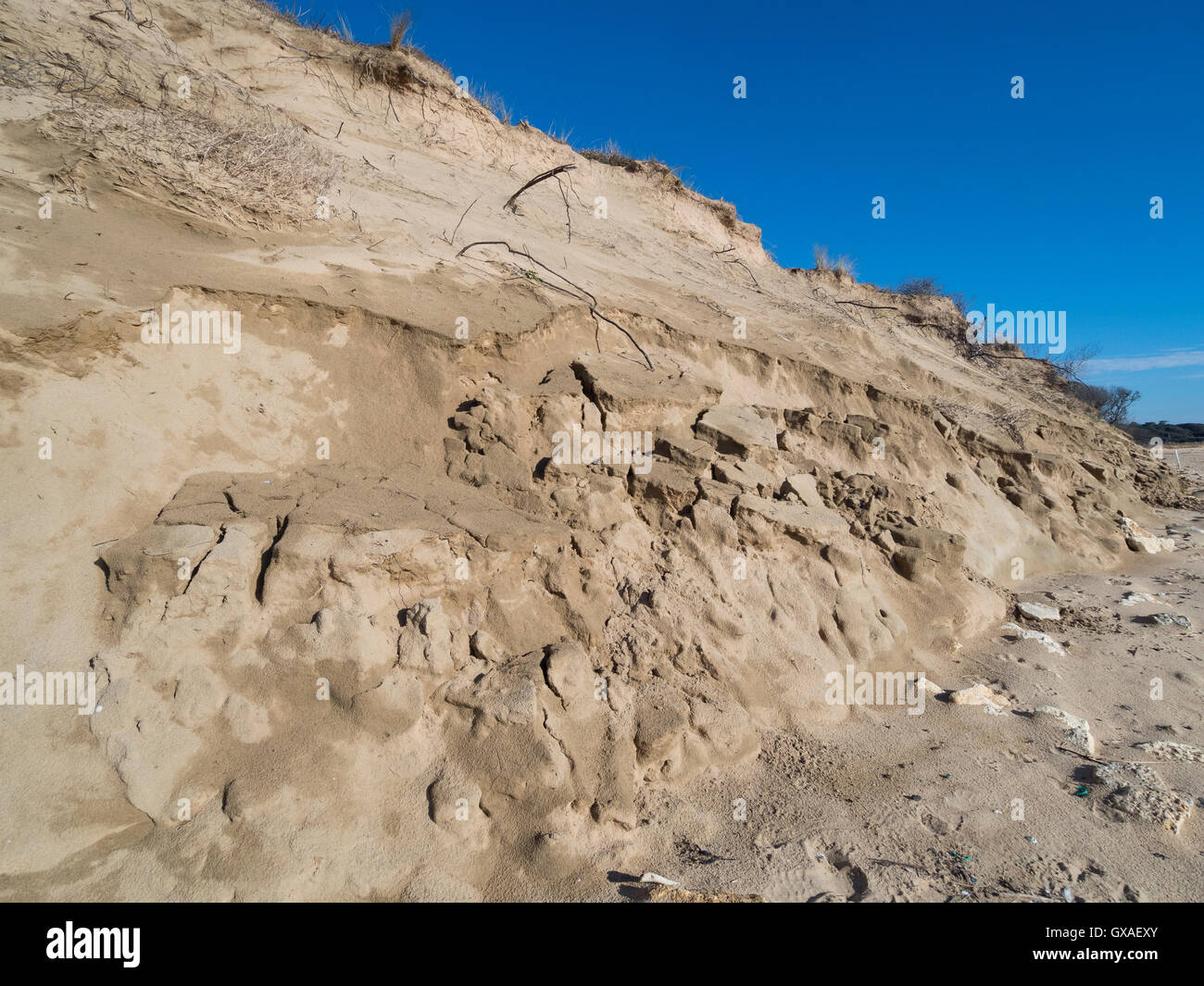 Collapse of the sand dune Stock Photo - Alamy
