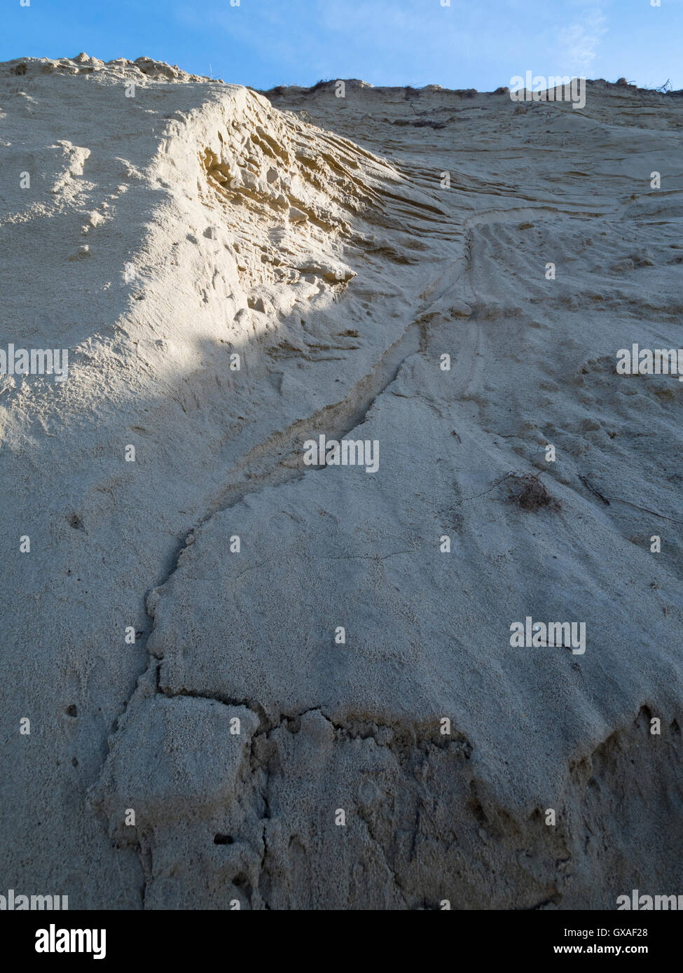 Collapse of the sand dune Stock Photo - Alamy