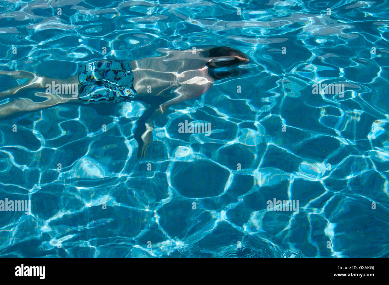 swimmer under water in pool Stock Photo - Alamy