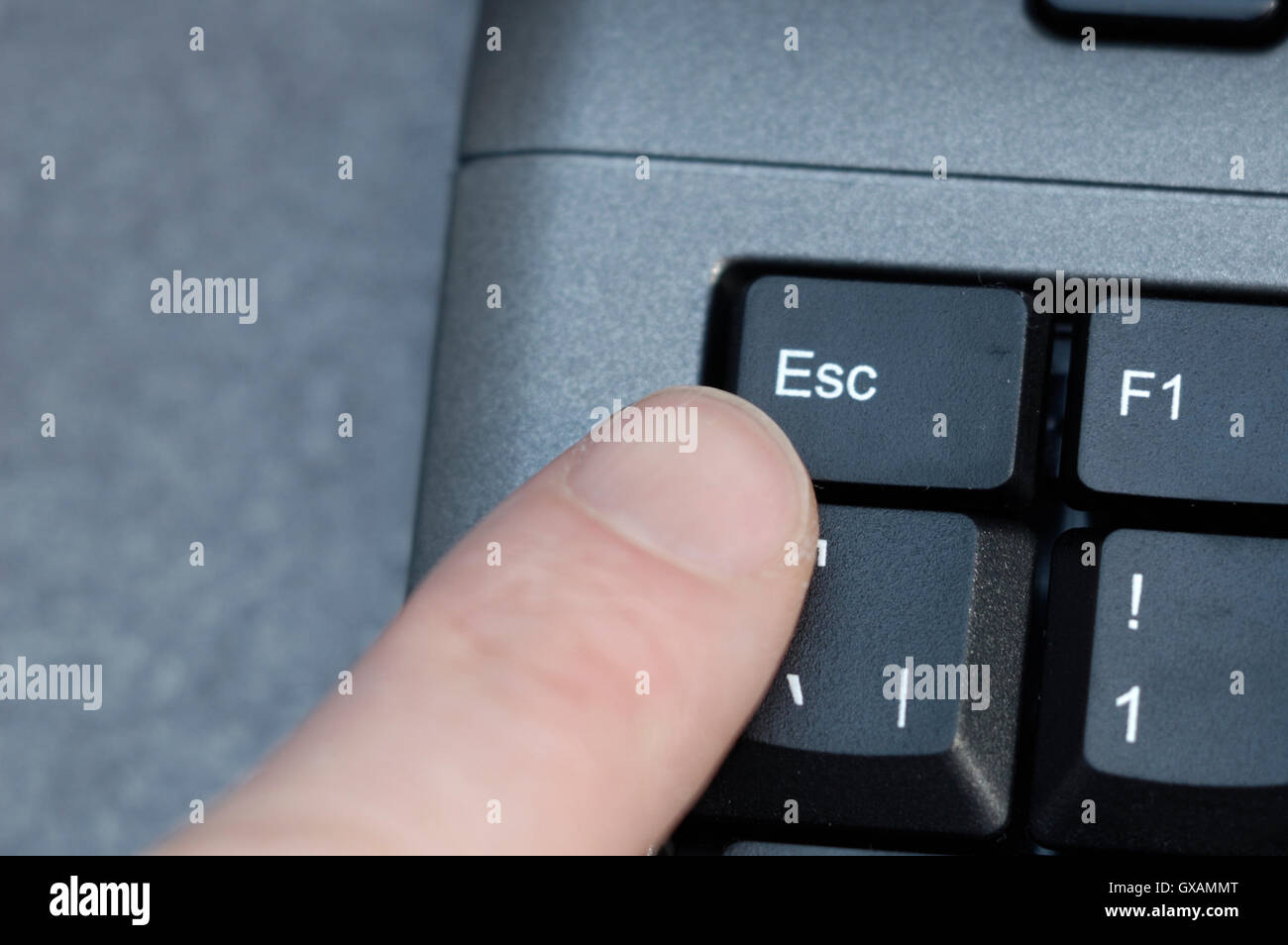 Finger pressing Escape Button Stock Photo - Alamy Finger pressing Escape Button Stock Photo - Alamy