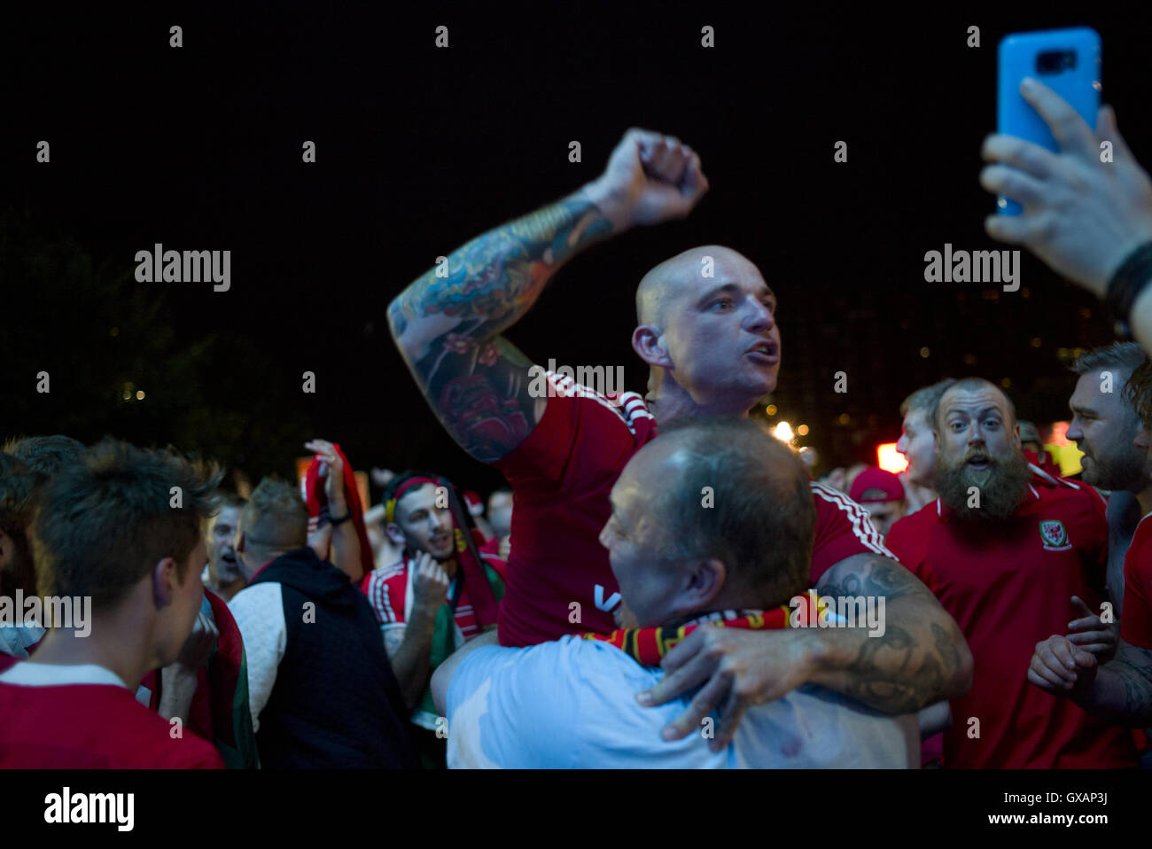 Welsh and Belgium football fans watch the UEFA Euro 2016 quarter-final ...