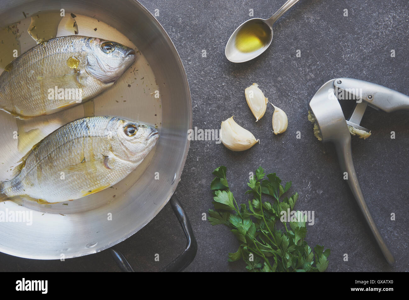 Fresh fishes preparing to be cooked, top view Stock Photo - Alamy