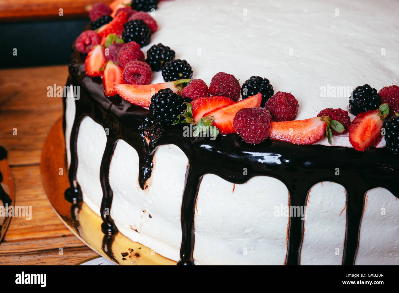 cake decorated with strawberry, raspberry and blackberry Stock Photo ...