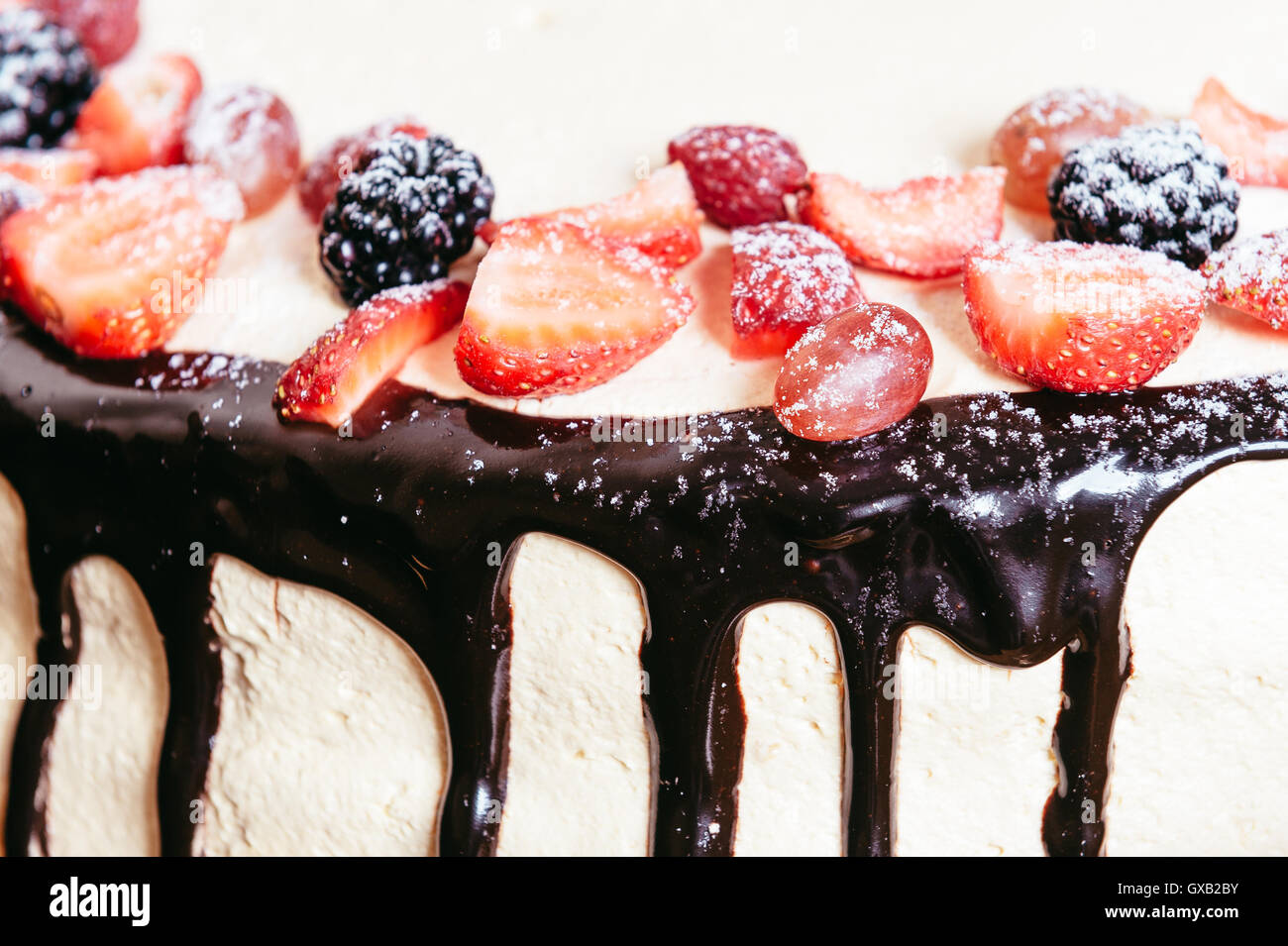cake decorated with strawberry, raspberry and blackberry Stock Photo ...