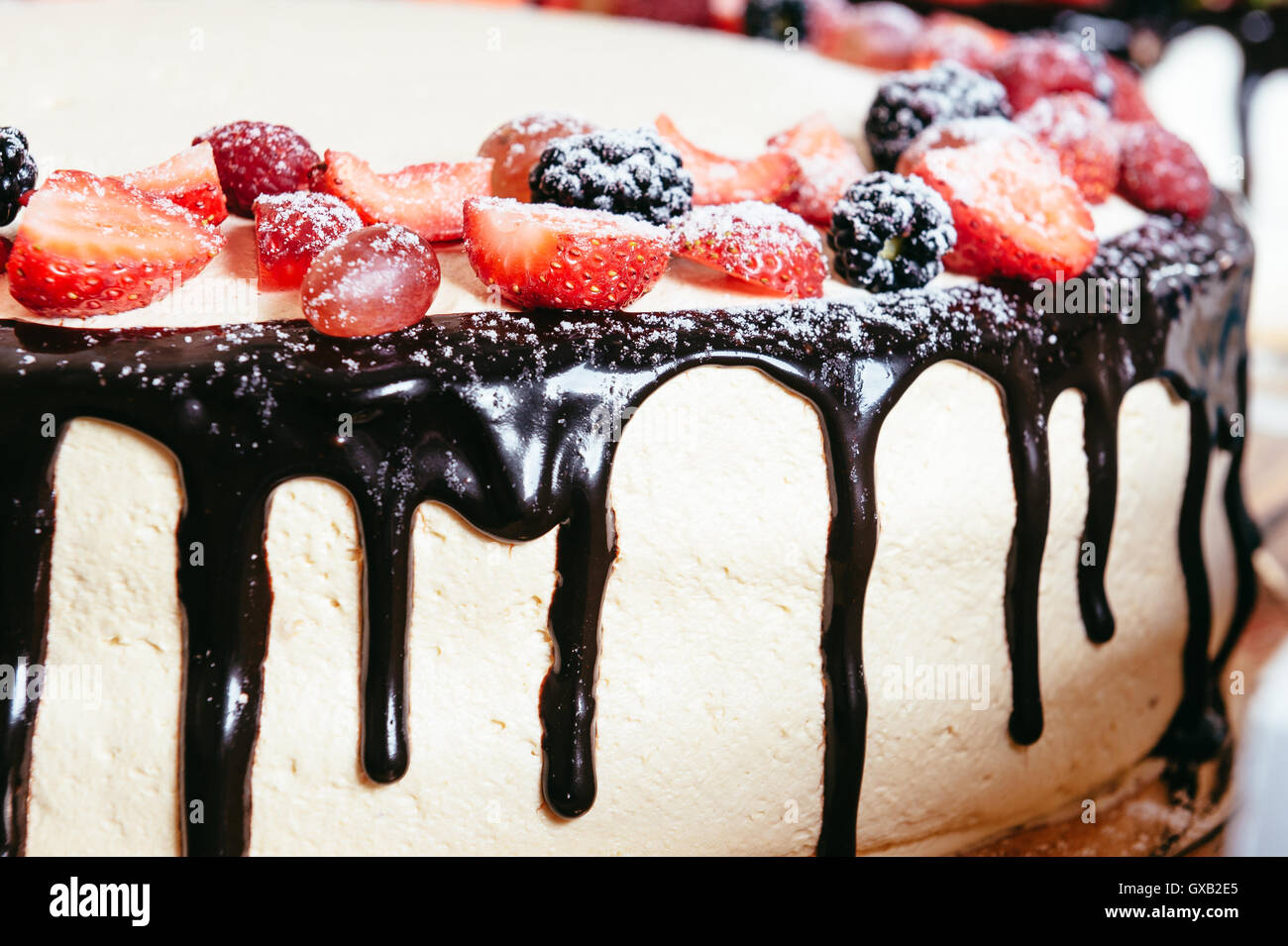 cake decorated with strawberry, raspberry and blackberry Stock Photo ...