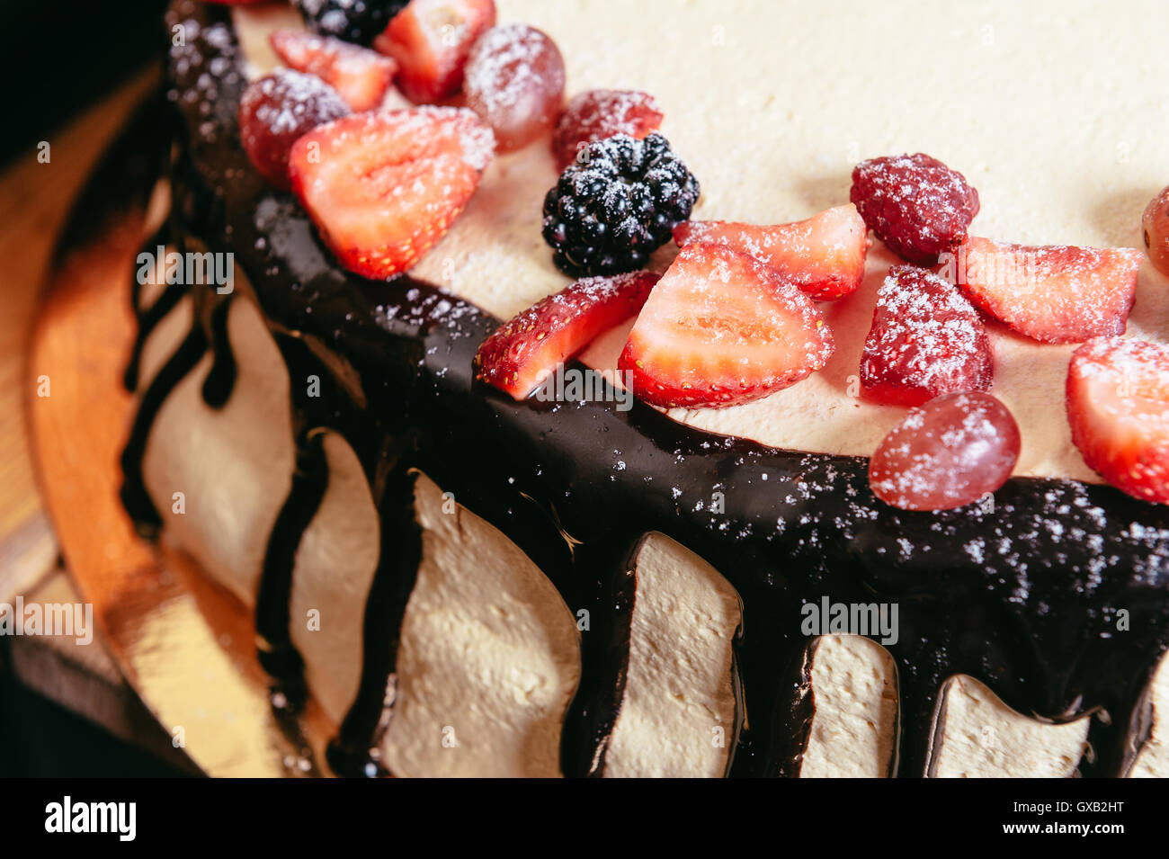 cake decorated with strawberry, raspberry and blackberry Stock Photo ...