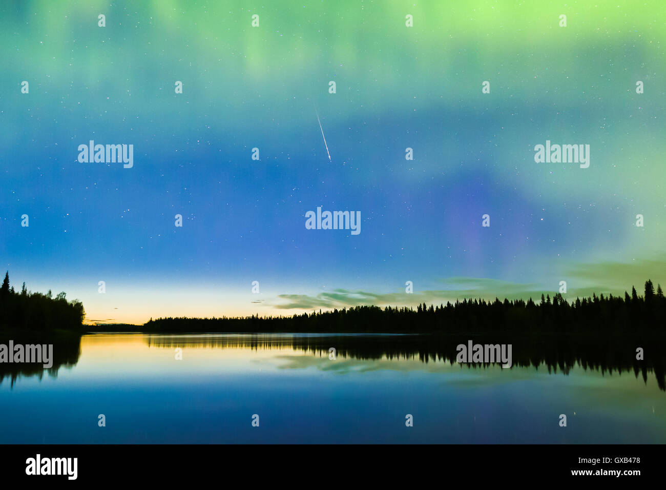 Shooting star and Northern lights on the sky Stock Photo - Alamy
