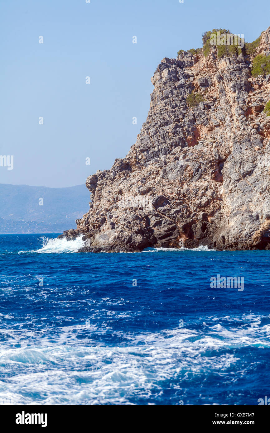 White waves and sea cliffs - typical landscape of Crete shores, Greece ...