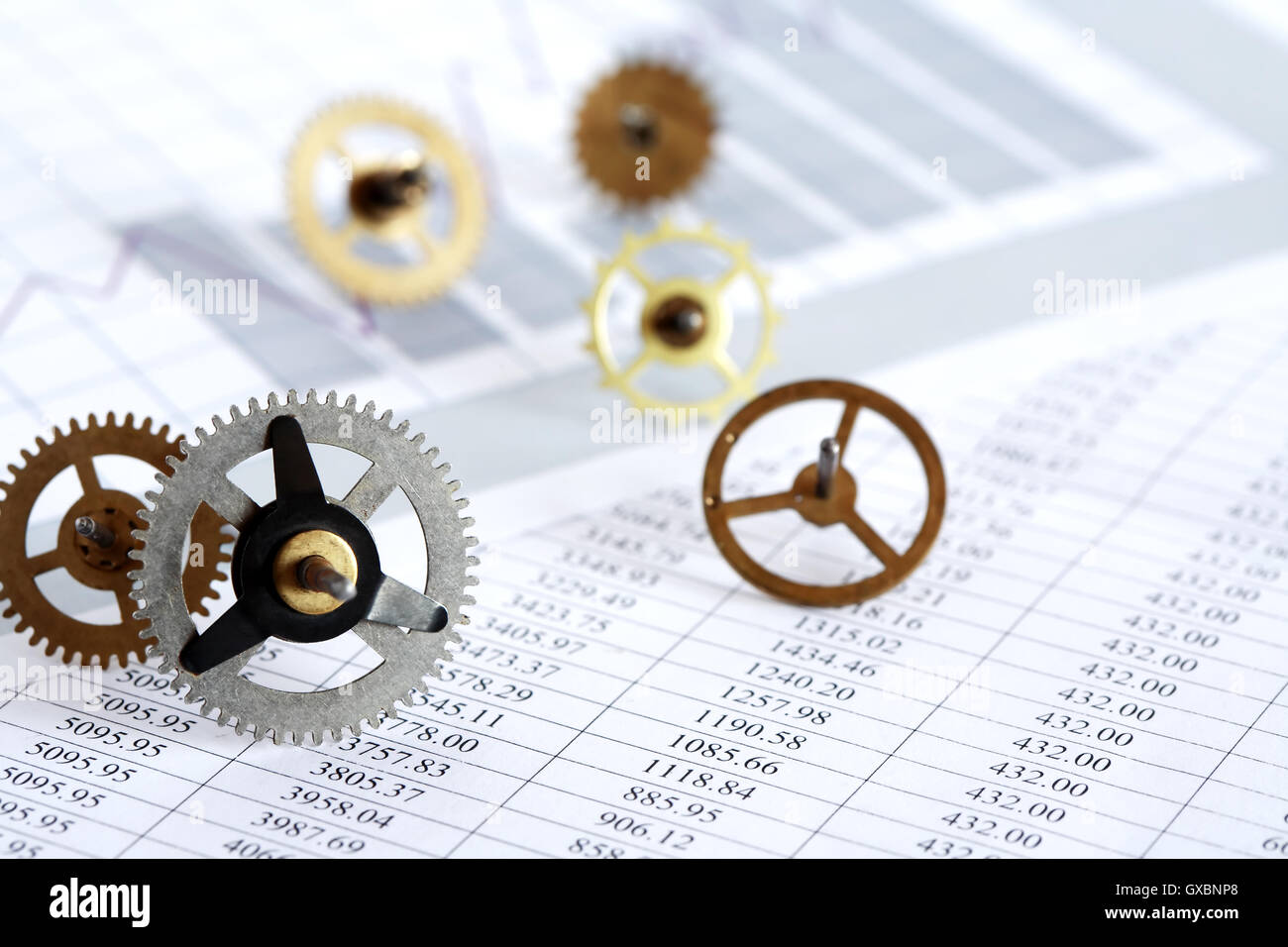 Business concept. Gears on background with chart and digits Stock Photo ...