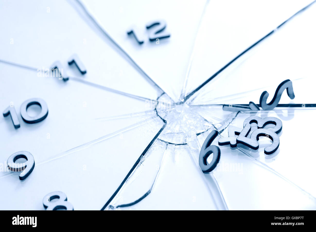 Deadline concept. Digits as clock face on shattered glass background ...