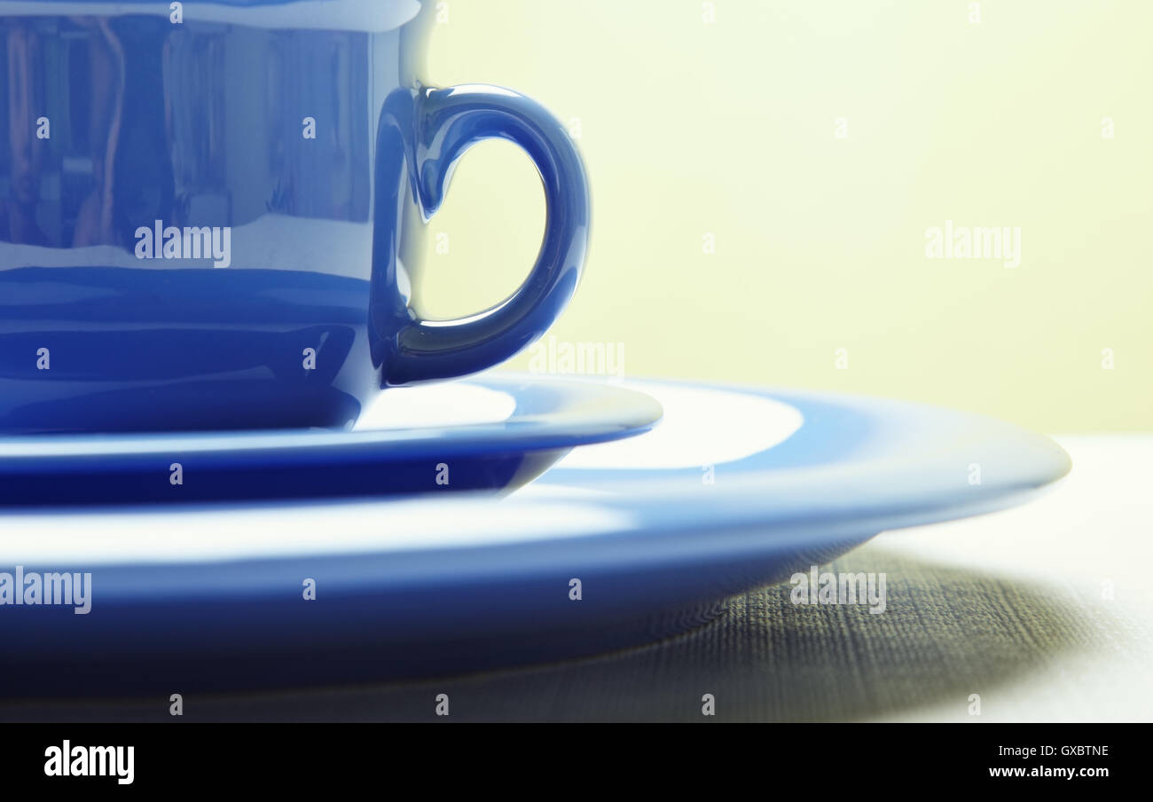 Blue teacup and plate Stock Photo - Alamy