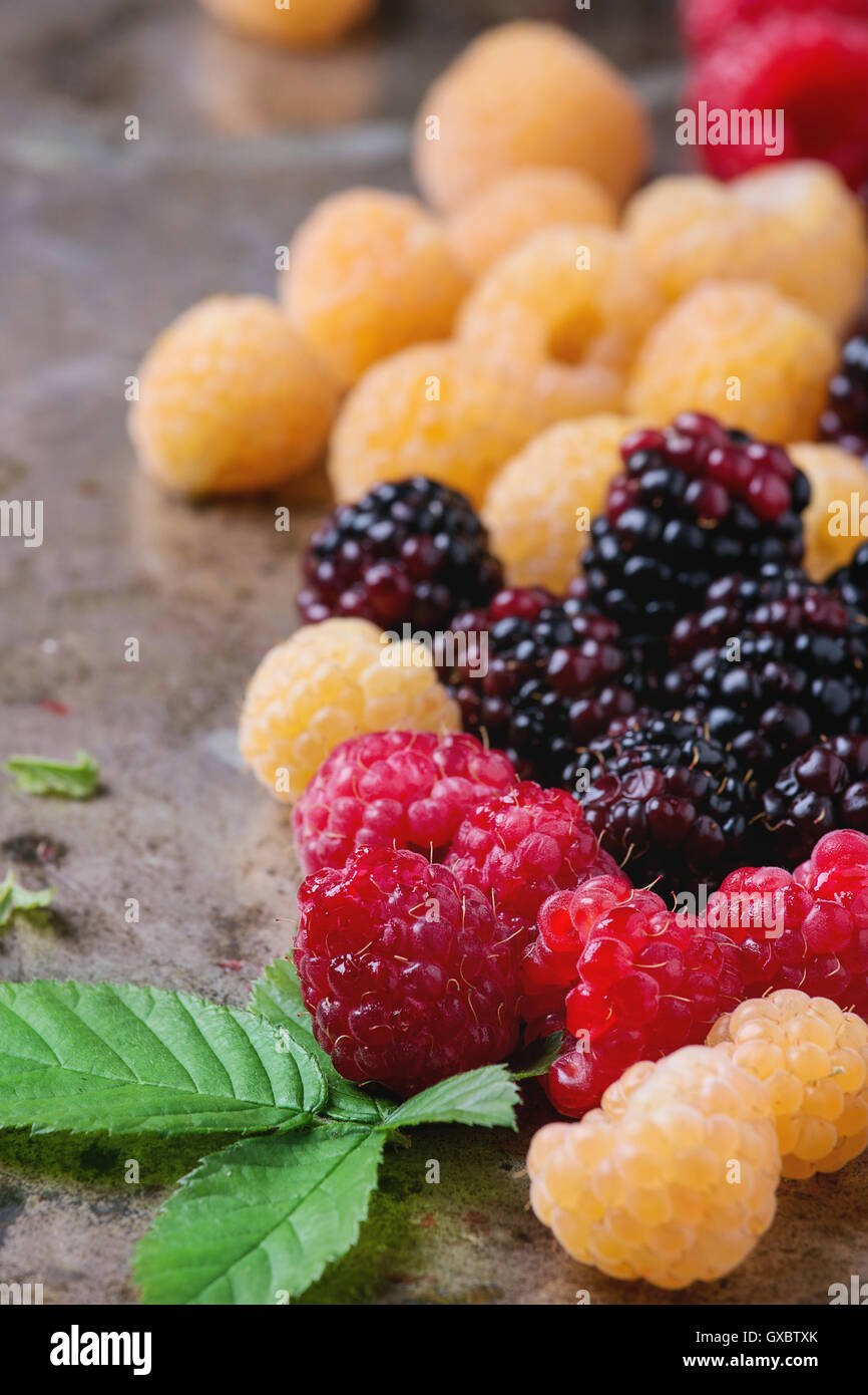 Heap of colorful raspberries Stock Photo - Alamy