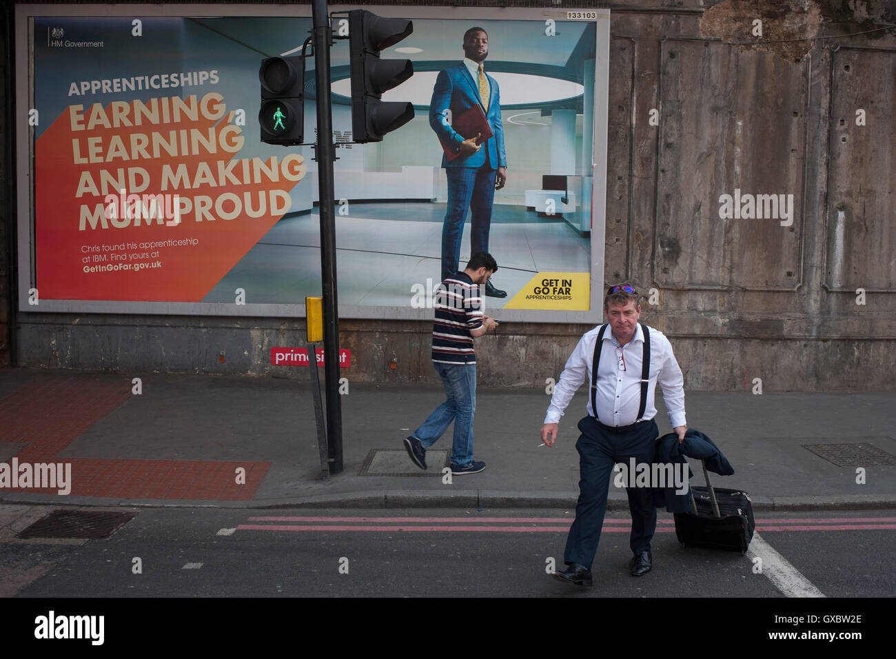 A government billboard campaign promotes working apprenticeships as an ...