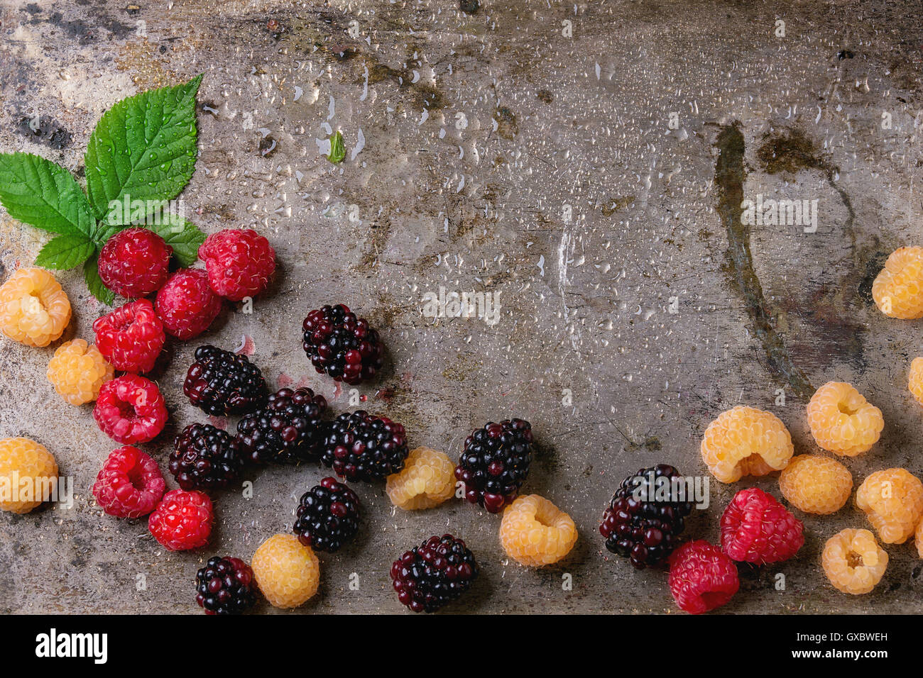 Heap of colorful raspberries Stock Photo - Alamy
